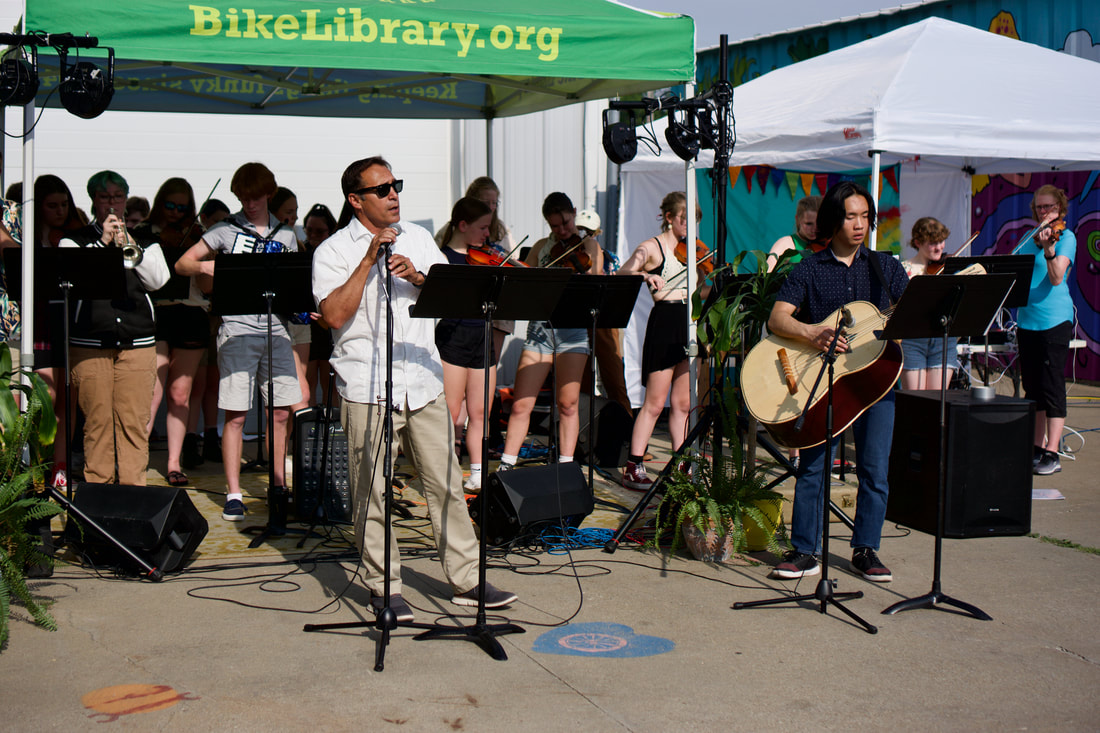 Bike-in Beats - BIKE LIBRARY INC